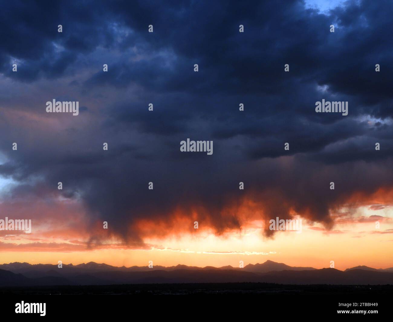 Dramatic sunset and Virga clouds over the front range of the Rocky ...