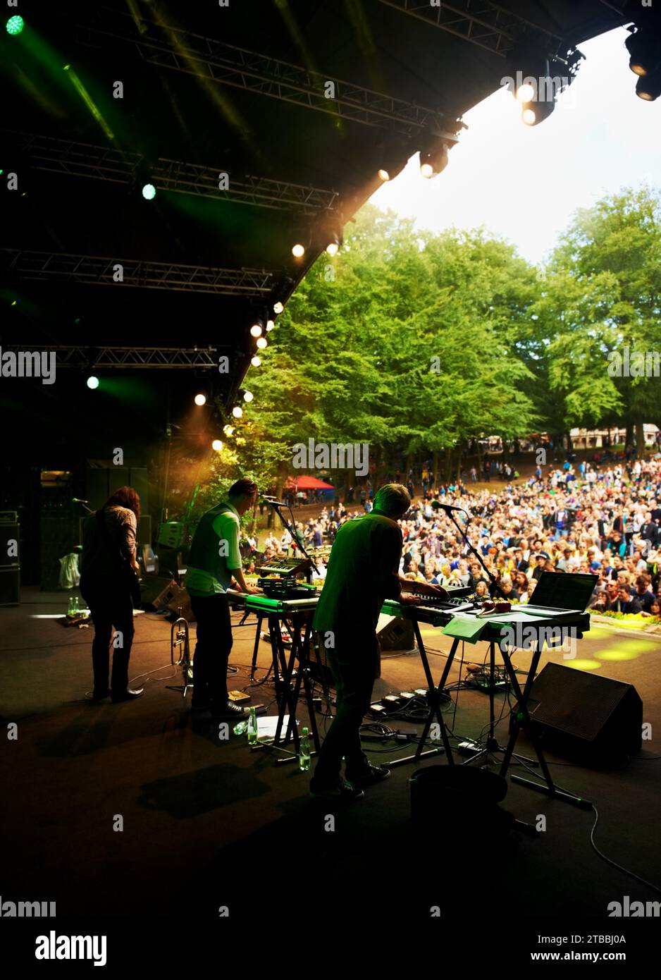 Band, music festival and stage in outdoors, party and event or energy ...