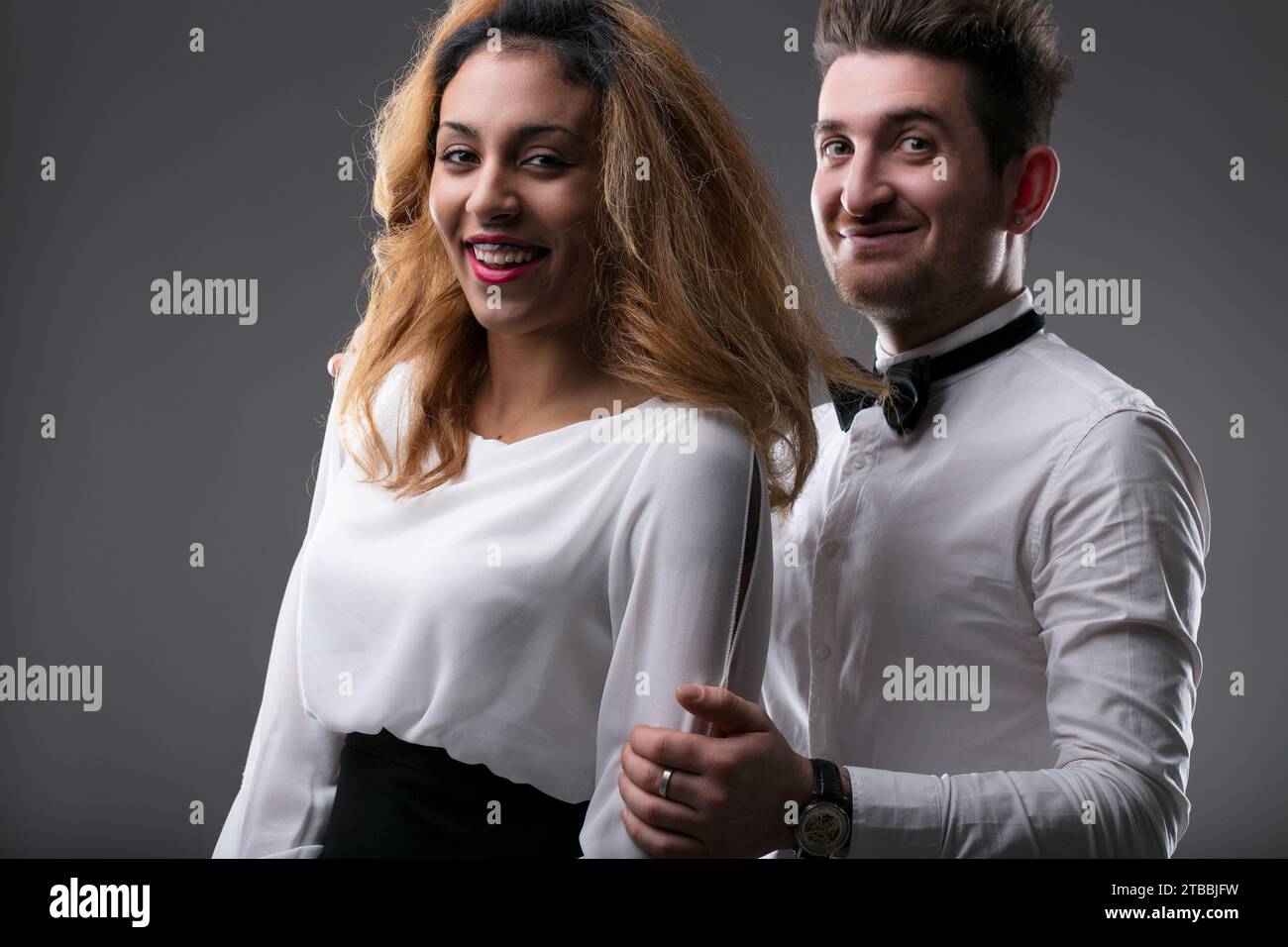 Close-up on joyous faces, her charisma matched by his cheeky expression ...