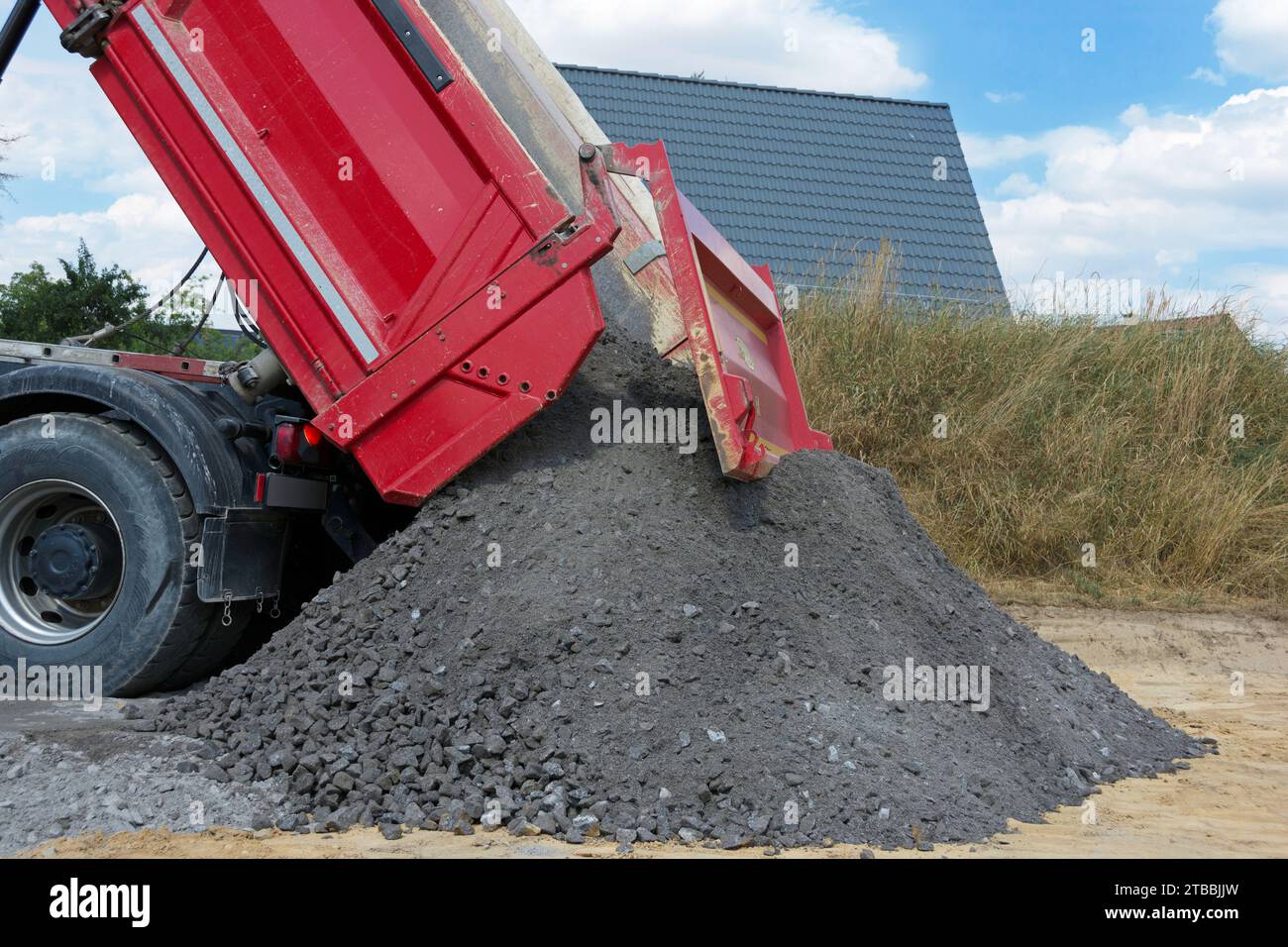 4-axle truck when tipping 0-44 mm gravel made of natural stone Stock ...
