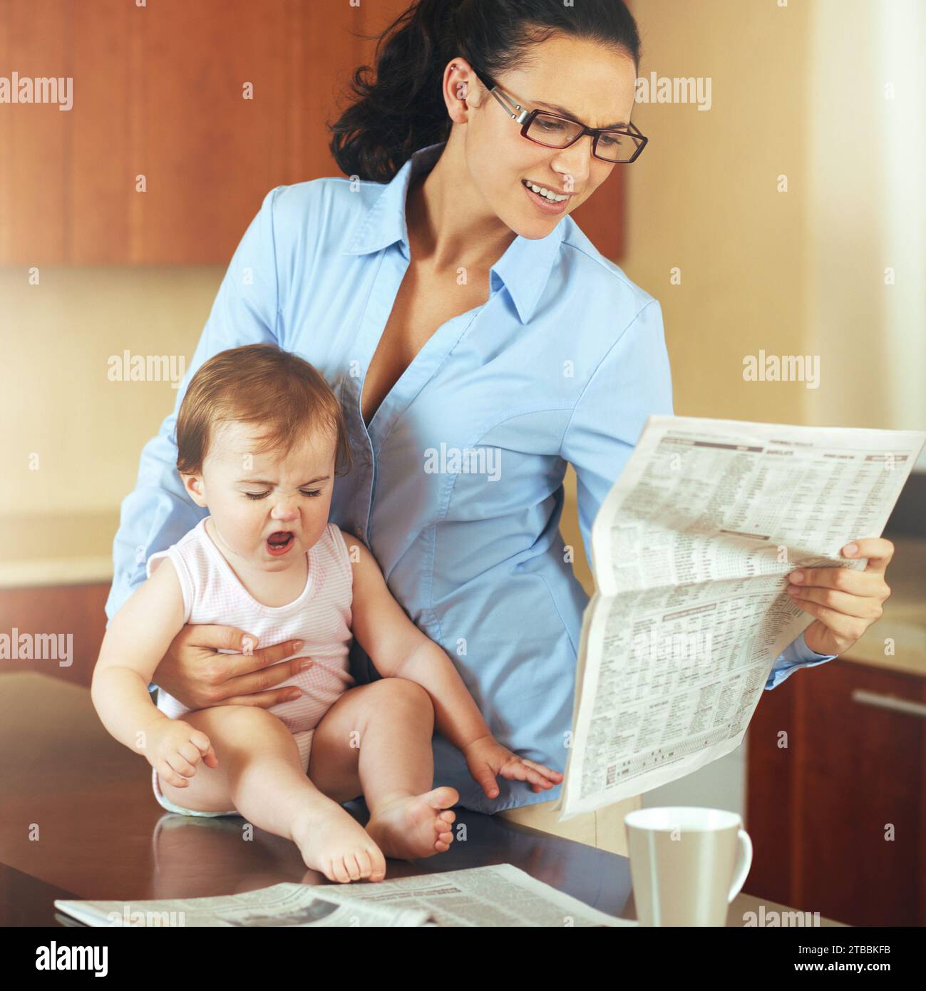Stressed mom in kitchen with kids hi-res stock photography and images ...