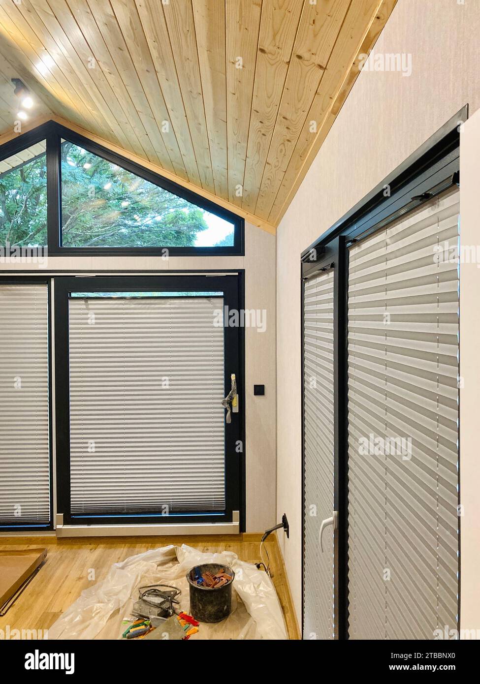 Modern interior in construction. Mobile home inside. Small hut. Warm ...