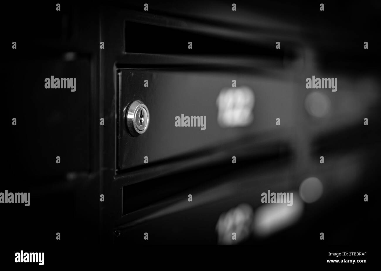 Mailbox with a lock in an apartment building Stock Photo - Alamy