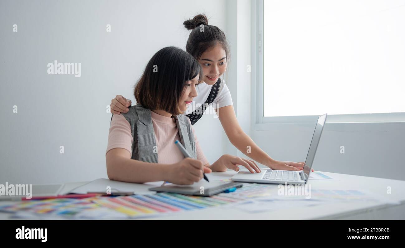 Team Designer using laptop to design fashion clothes. Fashion Design ...