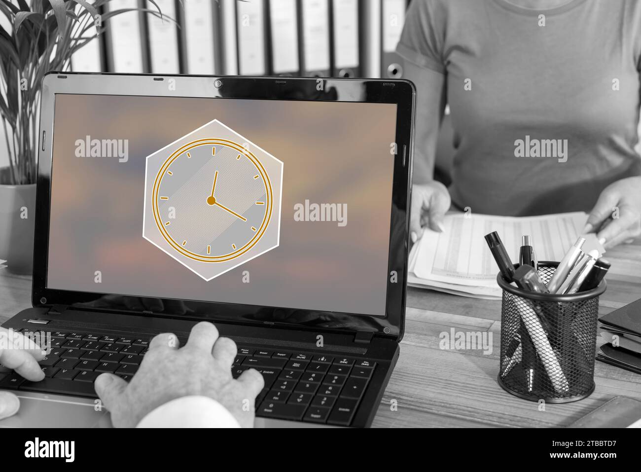 Laptop screen with time management concept Stock Photo - Alamy