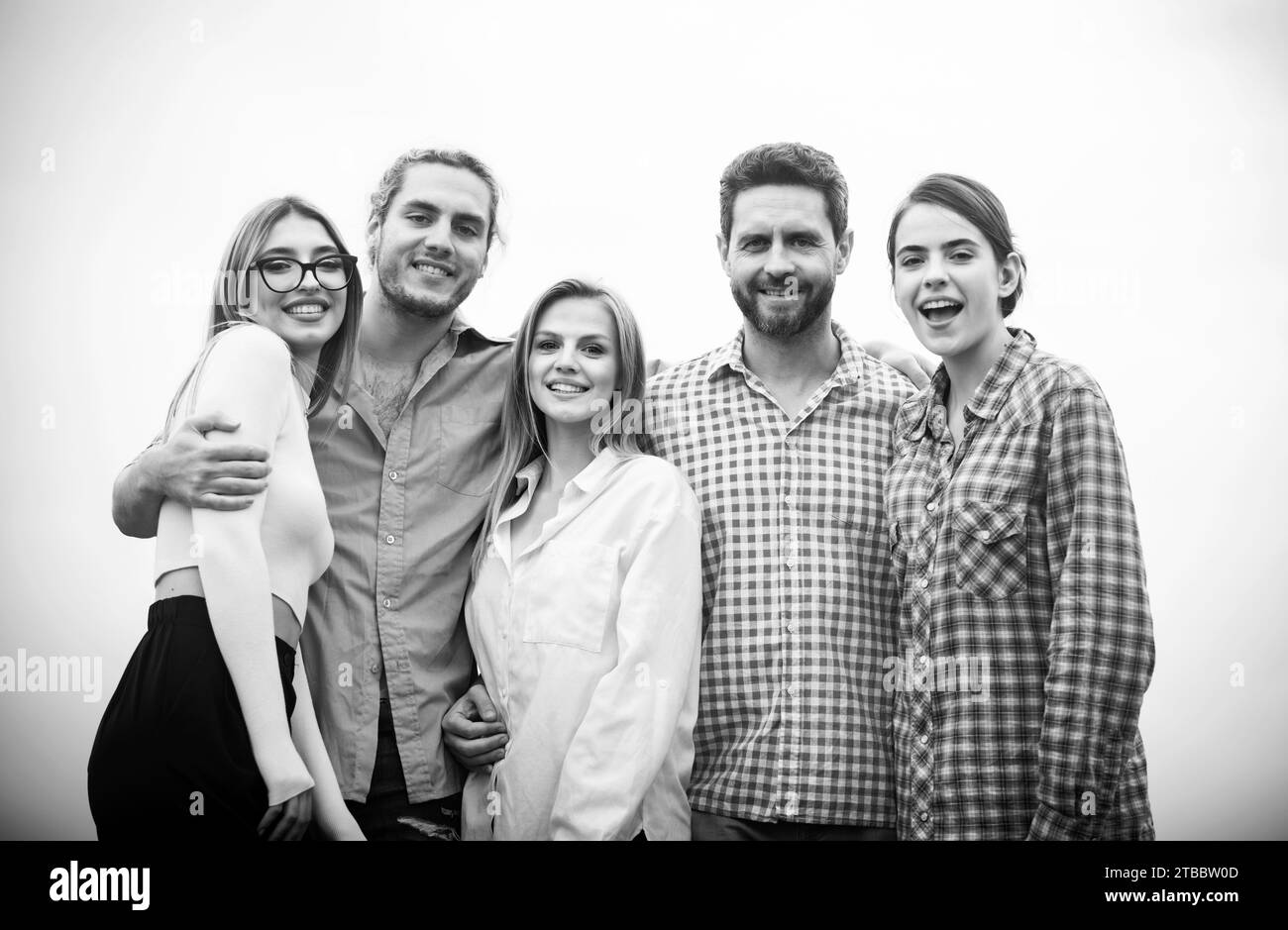 Smiling group of friends laughing. Company students best friends making ...