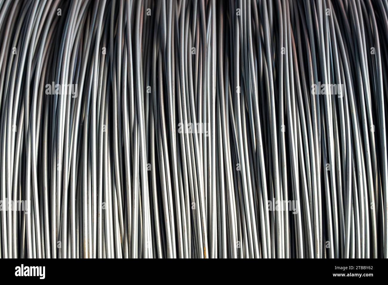 Pile of iron, metal or steel wire rod or coil background for ...