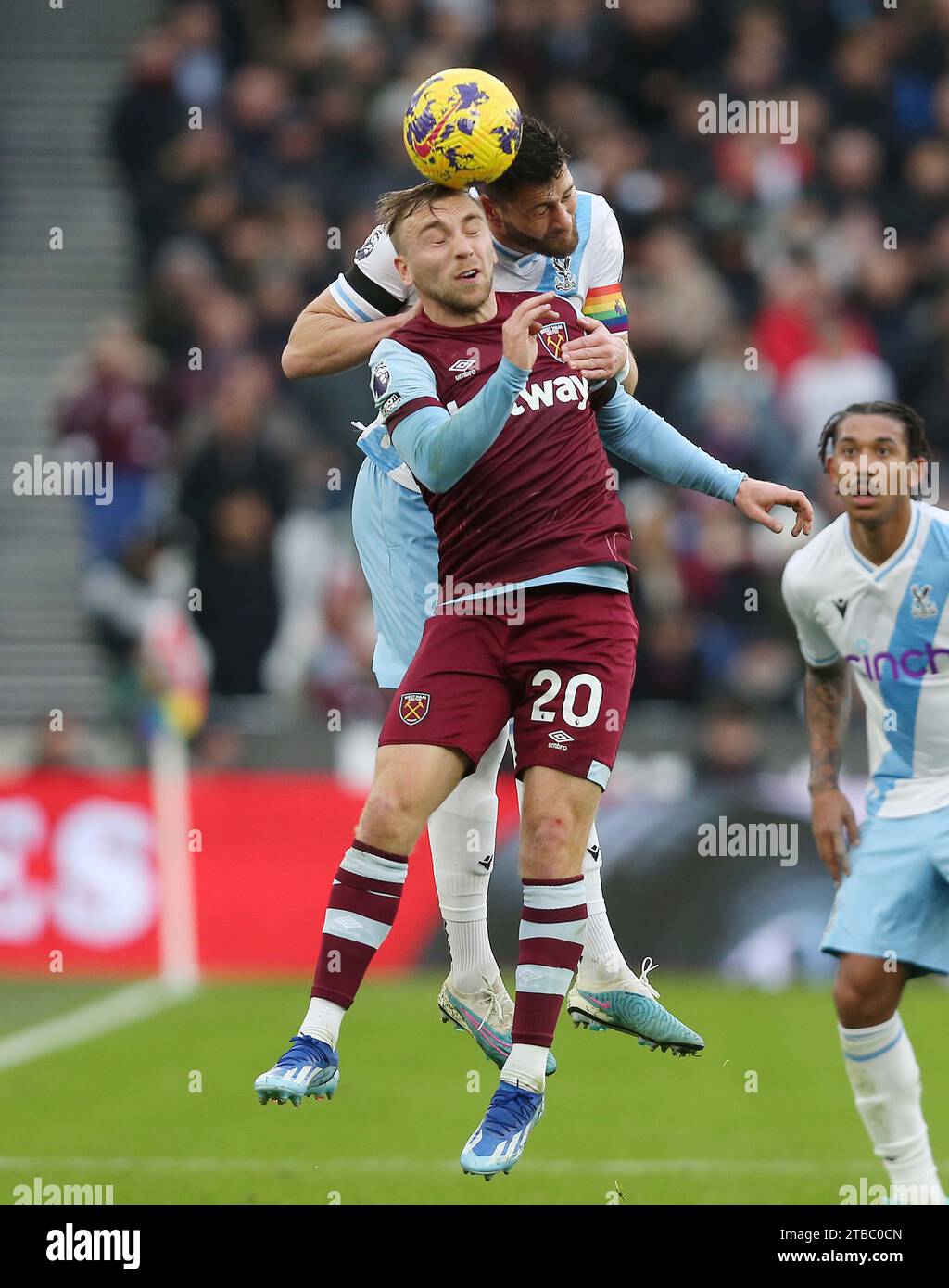 Jarrod Bowen of West Ham United challenges for the ariel ball with Joel ...