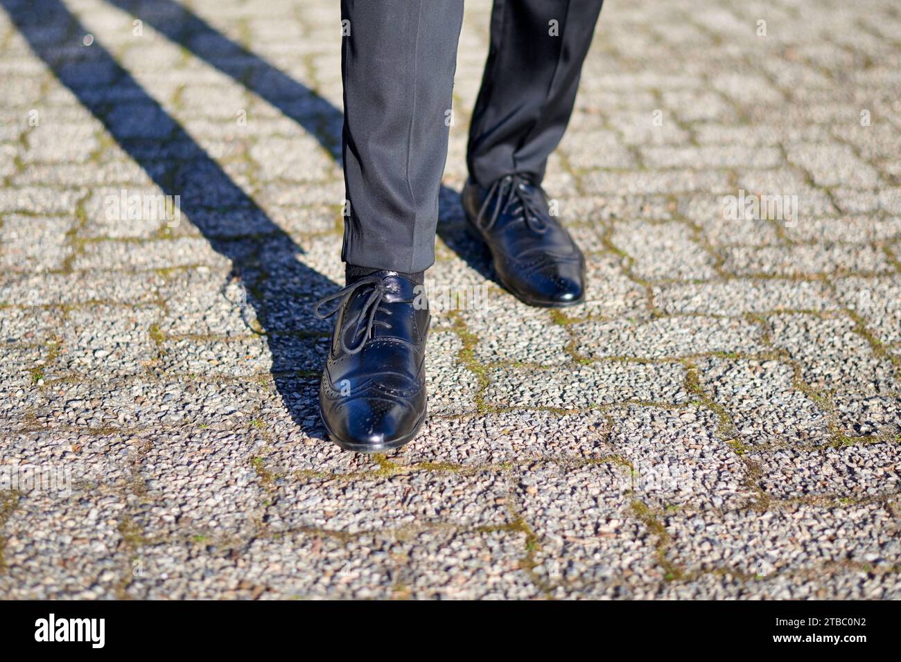Close-up of man's shoes, dressed formally, standing on pavement Stock ...