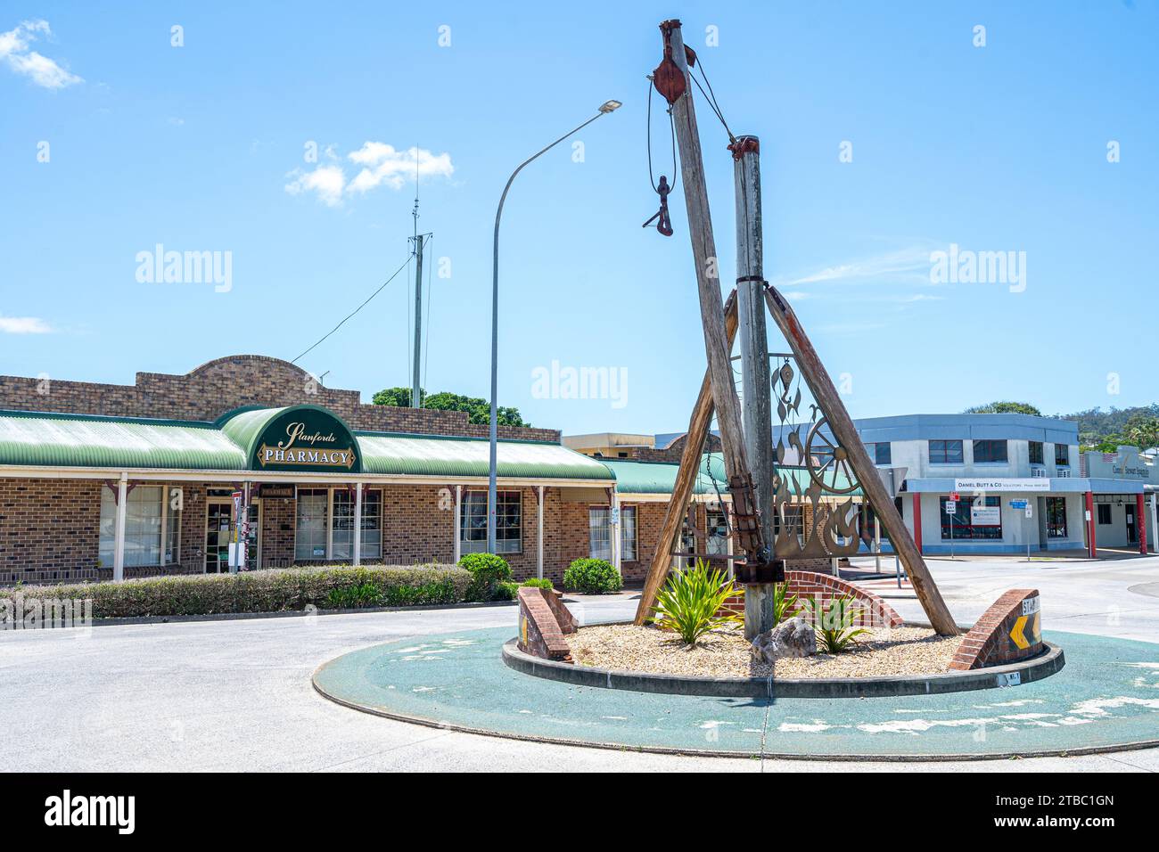 Sugar Derrick sculpture on traffic roundabout in main street of Maclean ...