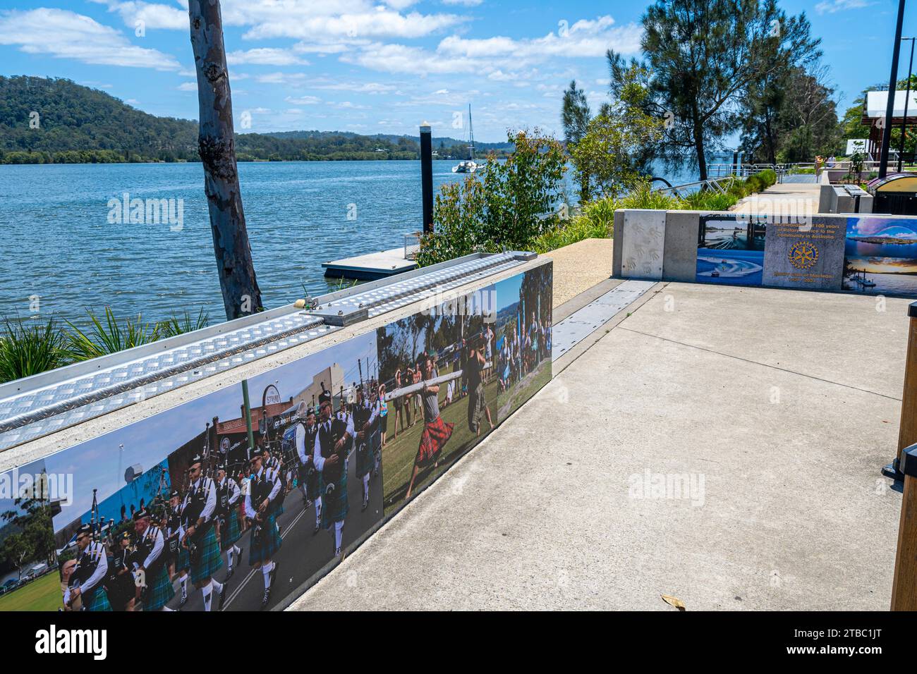 Moveable concrete flood barriers covered in artwork on backs of ...