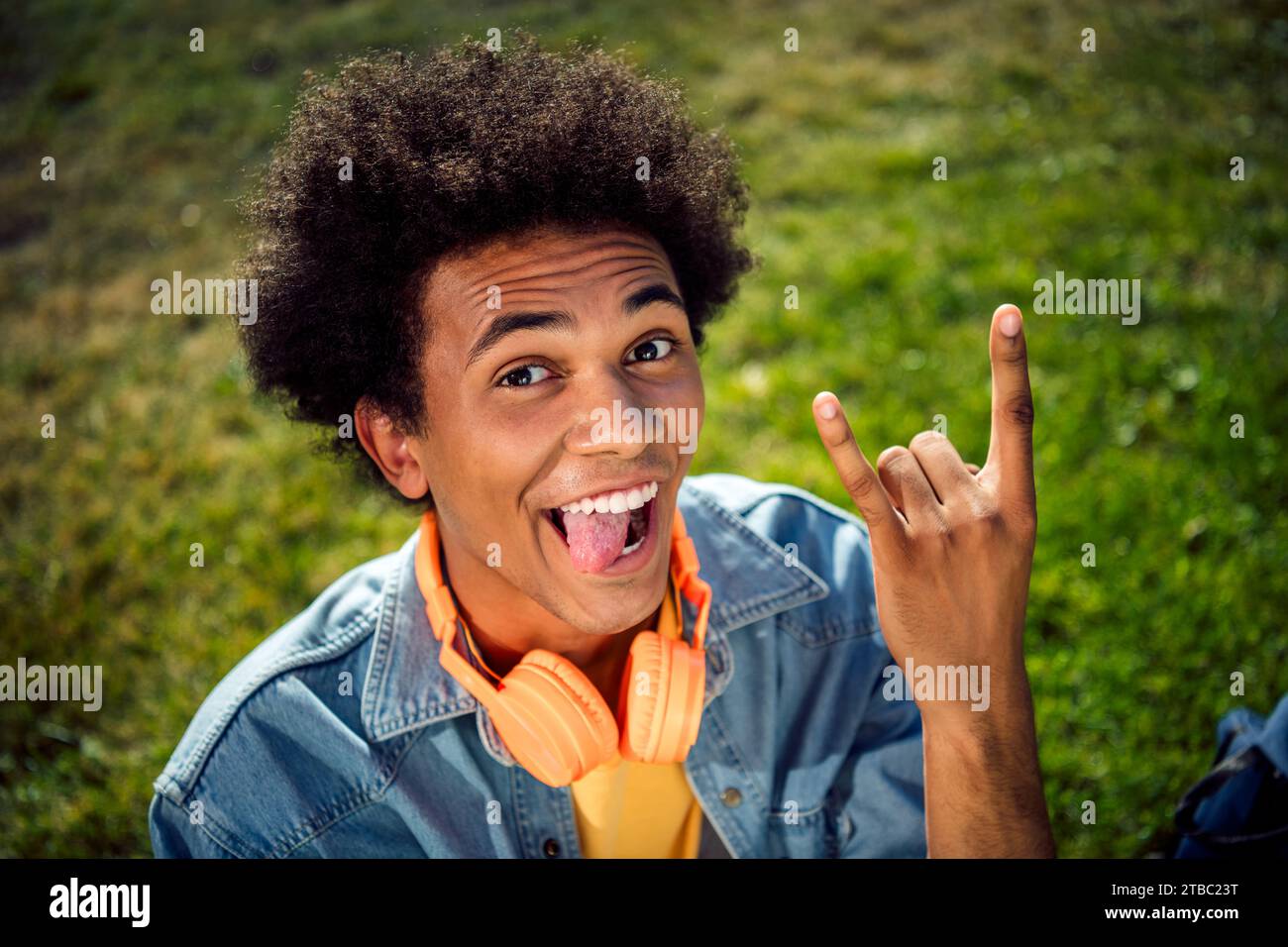 Rock fan tongue out hi-res stock photography and images - Alamy