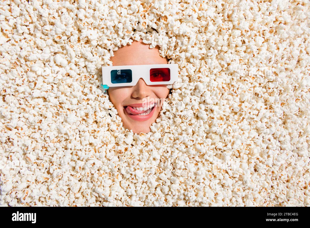 Girl tongue popcorn hi-res stock photography and images - Alamy