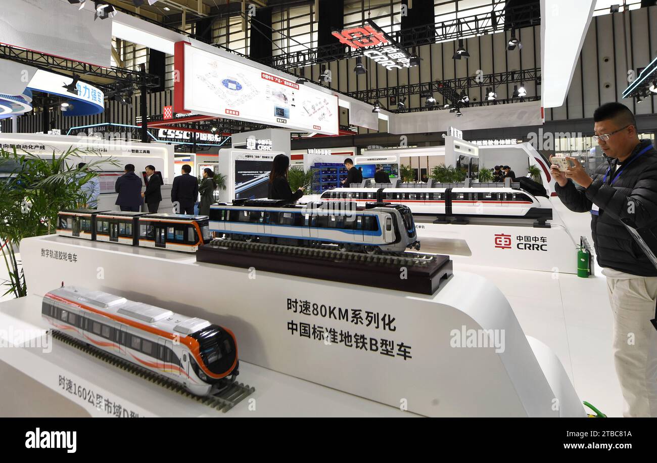 NANJING, CHINA - DECEMBER 6, 2023 - Visitors take photos of a smart ...