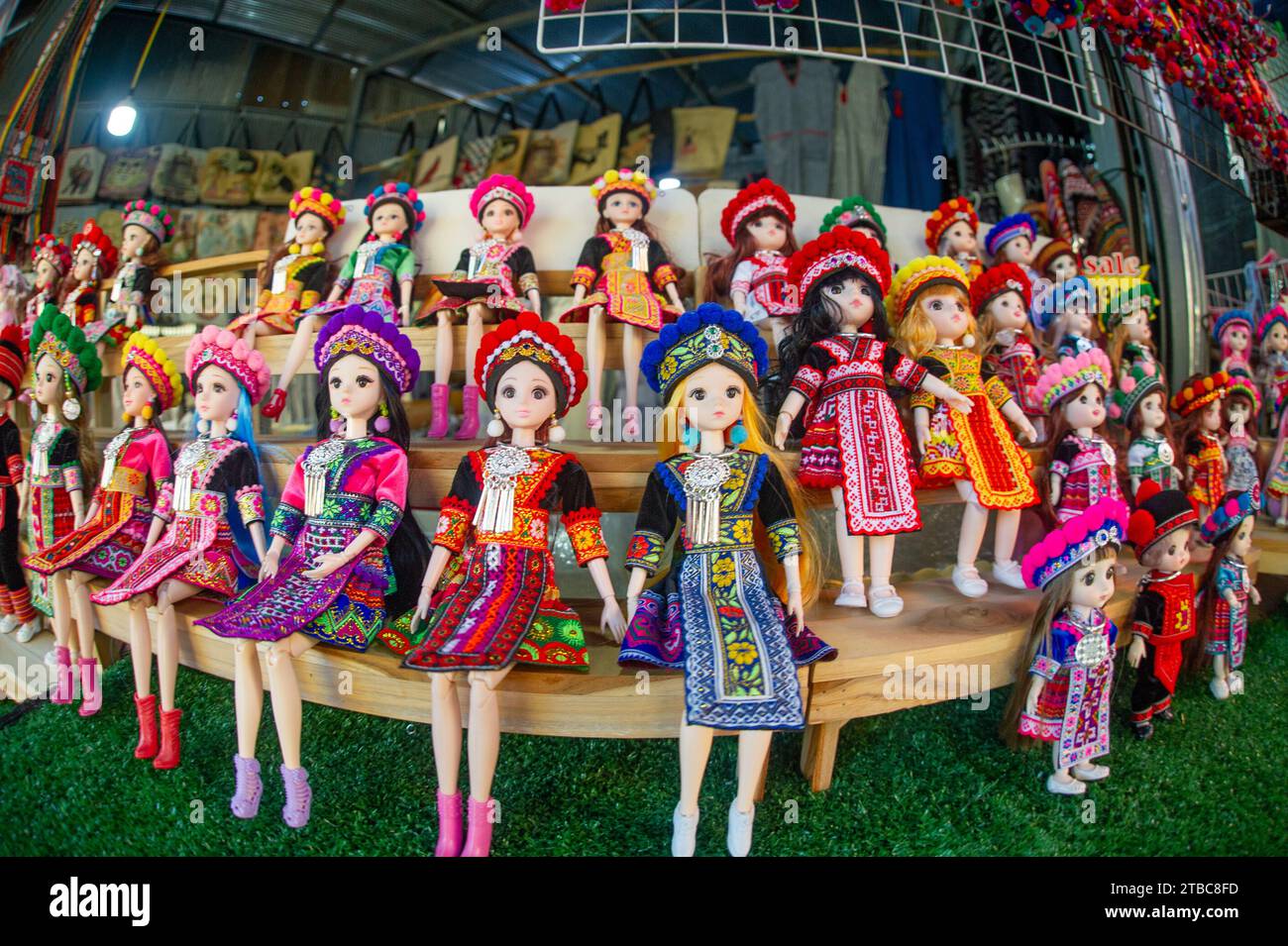 Shop in Thailand of dolls dressed in brightly colored costumes specific ...