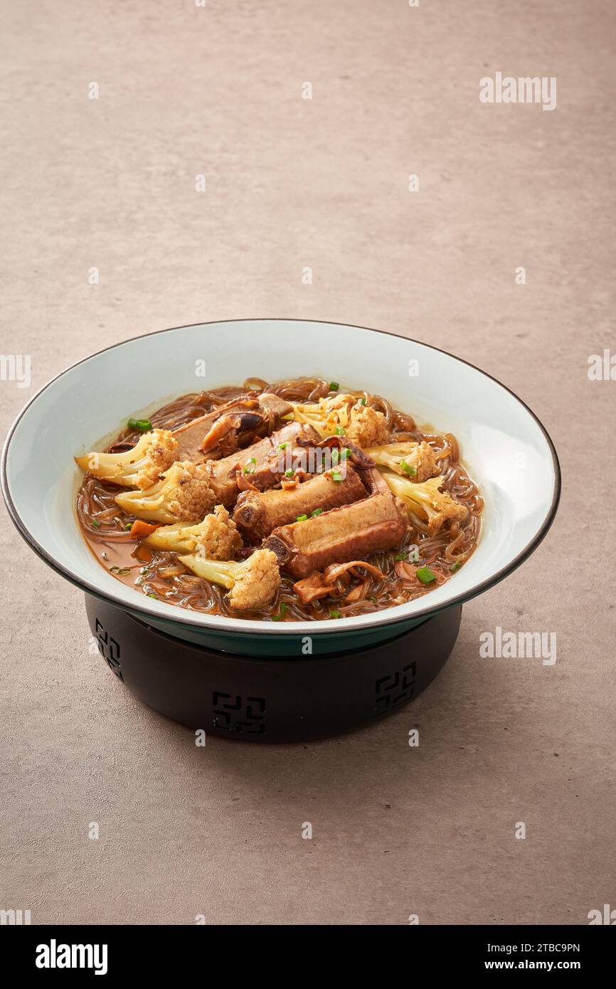 Sichuan sweet potato noodles with pork rib Stock Photo - Alamy