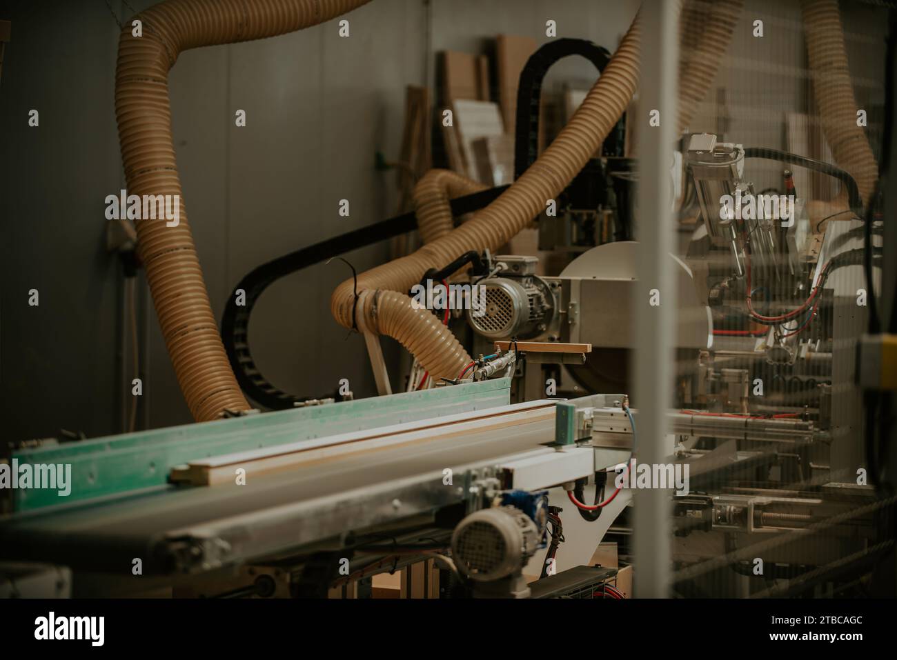 A state-of-the-art CNC machine in a modern wood processing facility ...