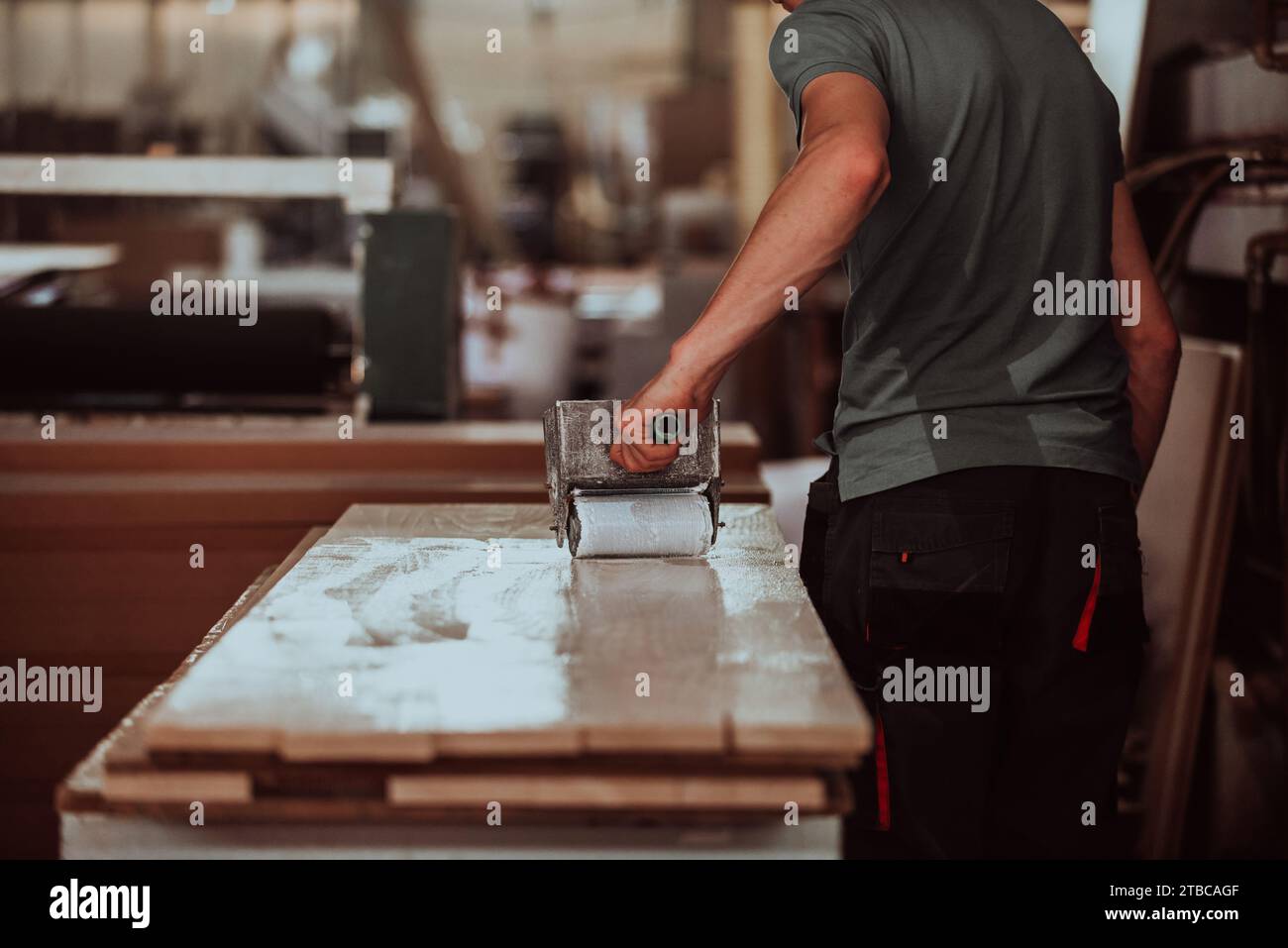 Skilled worker adding finishing touches hi-res stock photography and ...