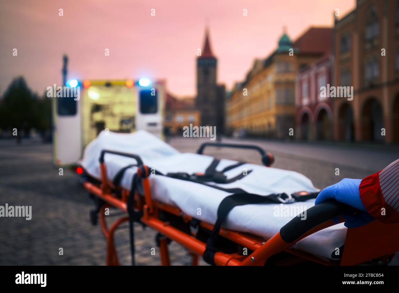 Paramedic preparing stretcher for patient. Ambulance car of emergency ...