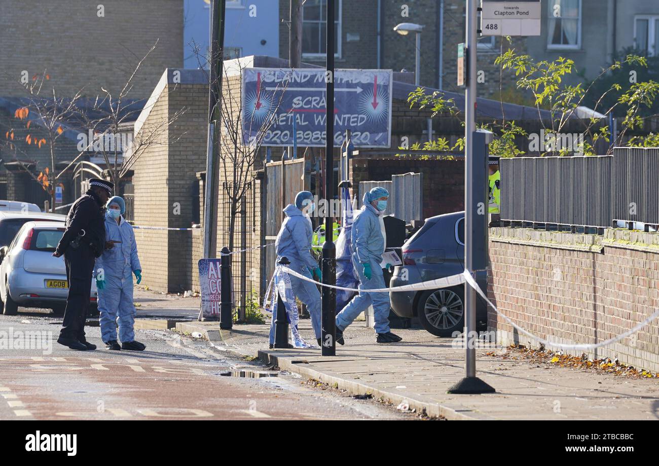 Forensic officers at the scene near Vine Close, Hackney, east London ...