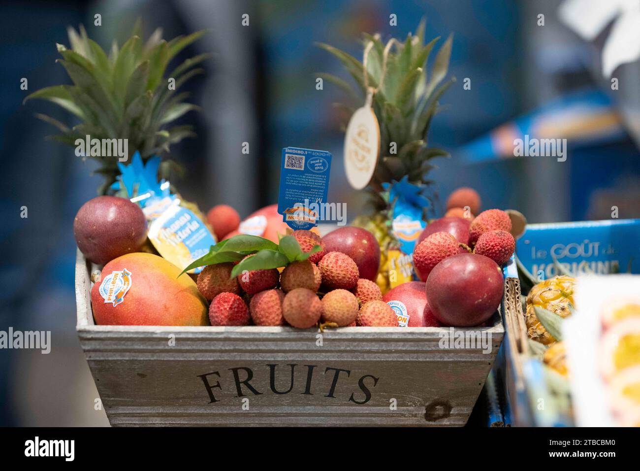 This photograph shows lychee, pineapple, passion fruit and mango ...