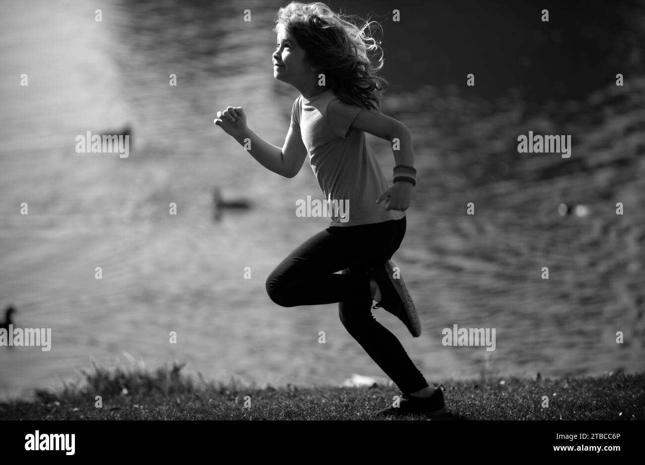 Kids sprinting Black and White Stock Photos & Images - Alamy