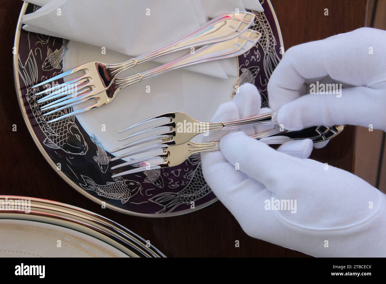 Silver plate white gloves hi-res stock photography and images - Alamy