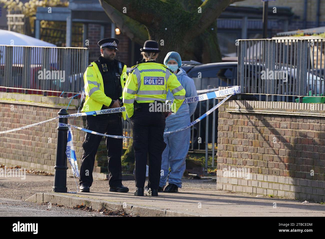 Police officers at the scene near Vine Close, Hackney, east London ...