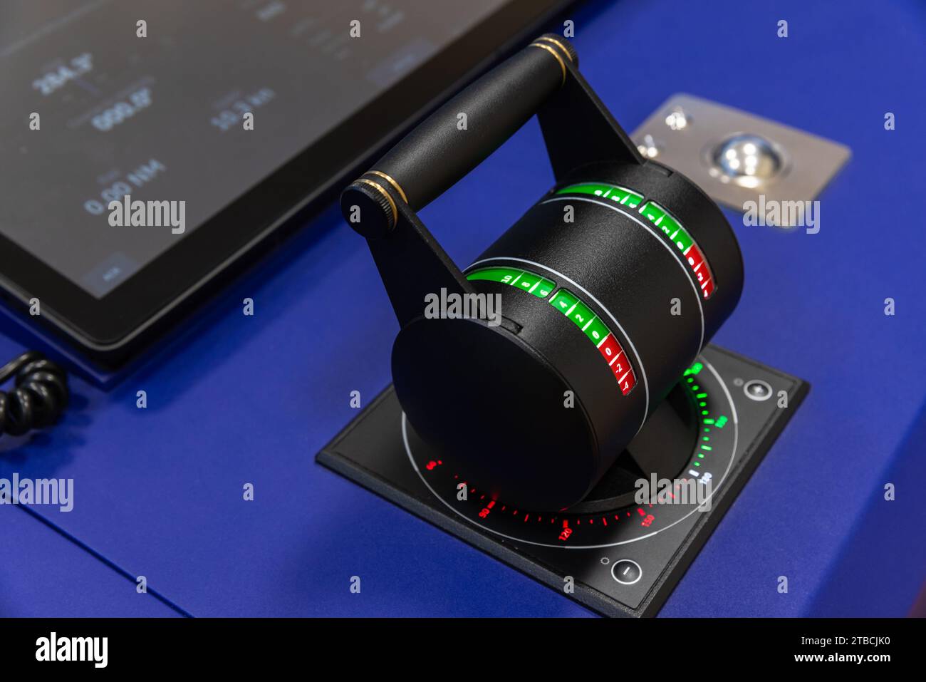 Vessel control panel with engine accelerator in half ahead position ...