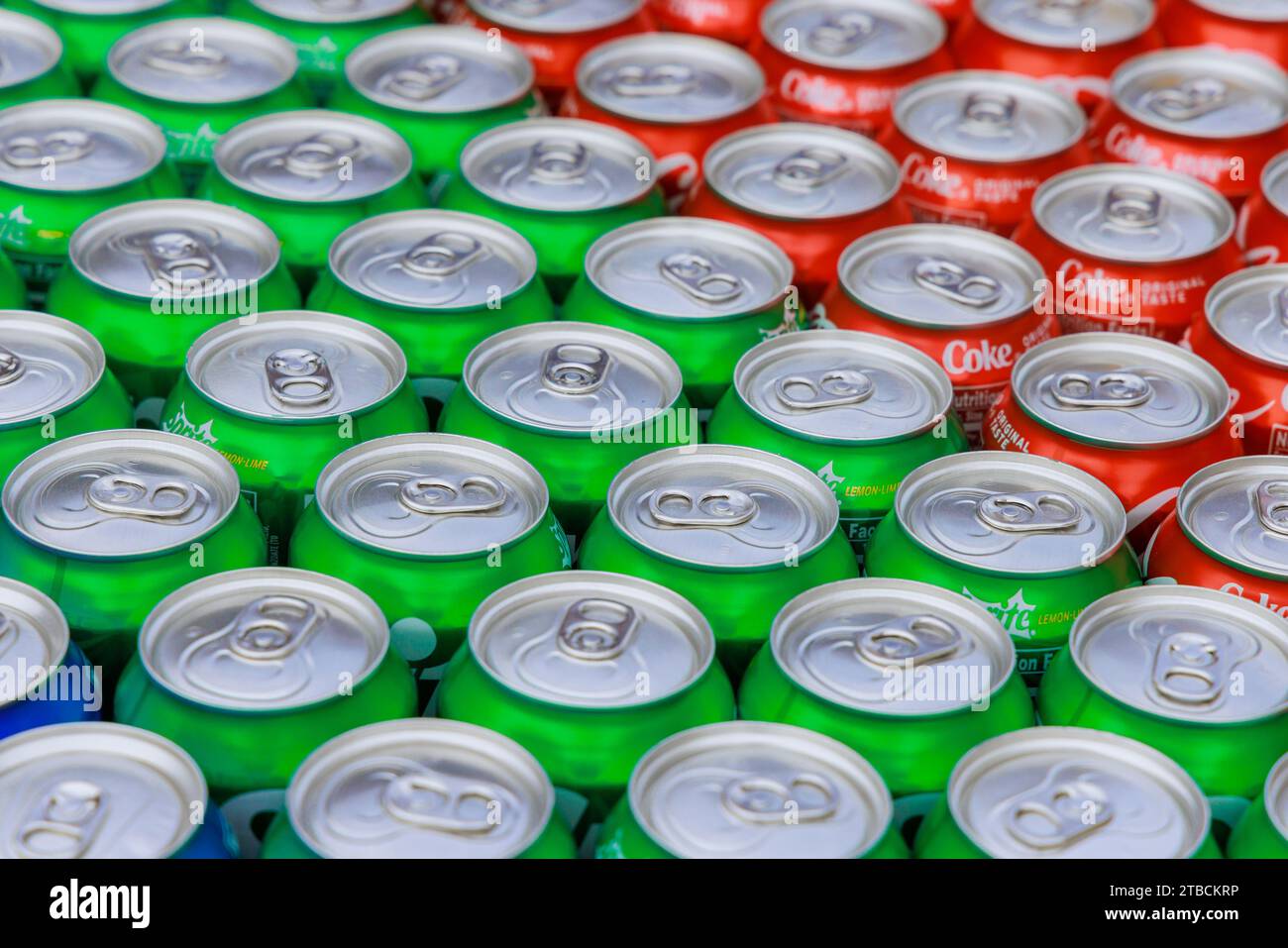 Aluminum many cans of Sprite, Coca-Cola, are arranged in rows Stock ...