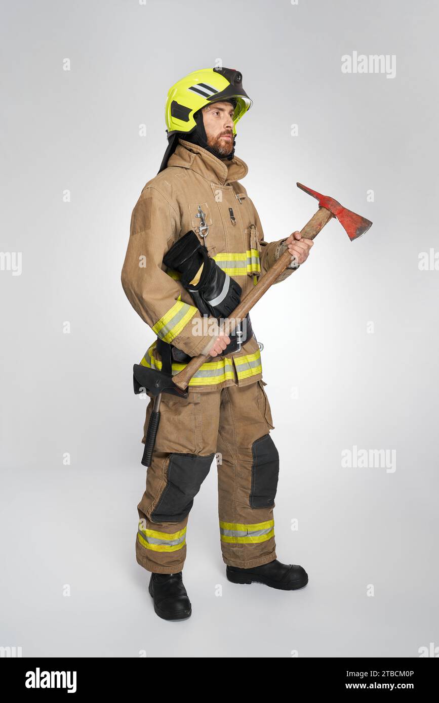 Professional fireman in full equipment hi-res stock photography and ...