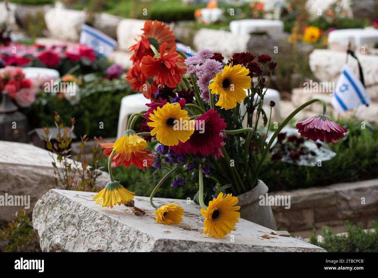 Flowers are laid on the grave of a fallen soldier in Jerusalem's Har ...
