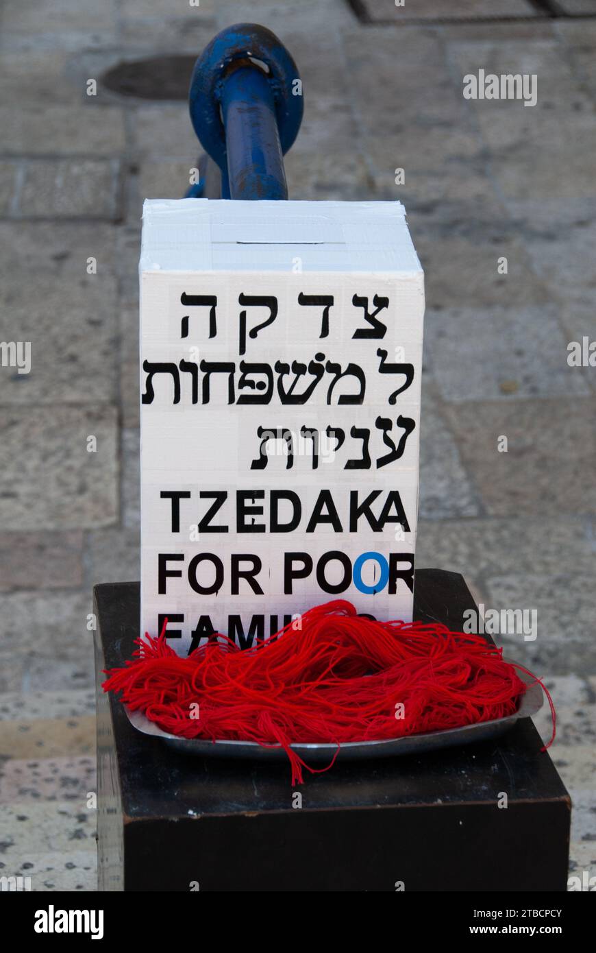A Jewish collection box for donations to the poor and needy. Donors ...