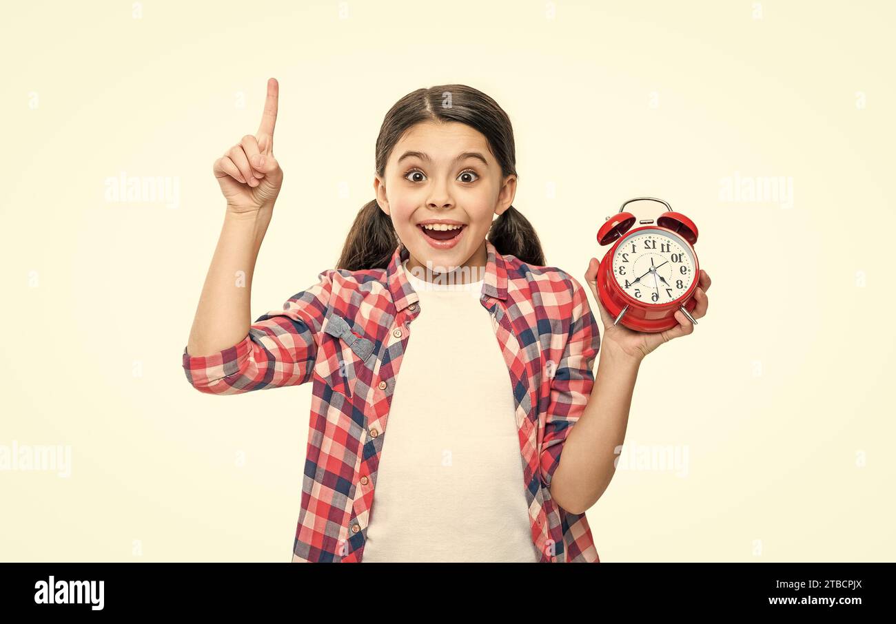photo of inspired punctual teen girl with alarm clock. punctual teen ...
