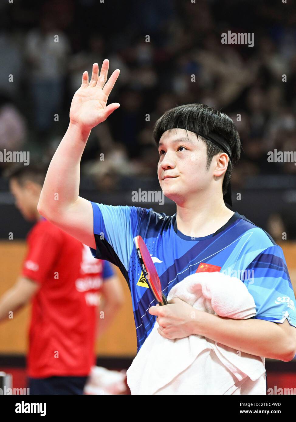 Chengdu, China's Sichuan Province. 6th Dec, 2023. Fan Zhendong of China greets spectators after ...