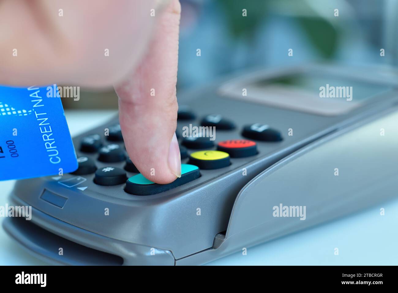 Hand using credit card to pay. Electronic money and shopping concept ...