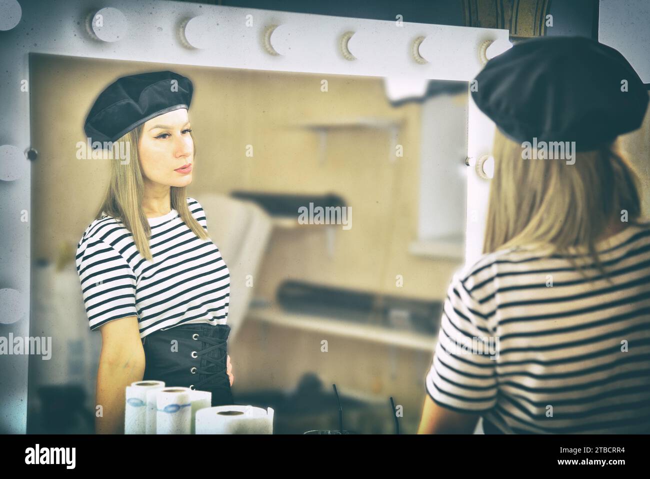 Woman master of art of tattooing in workshop studio. Art and design ...