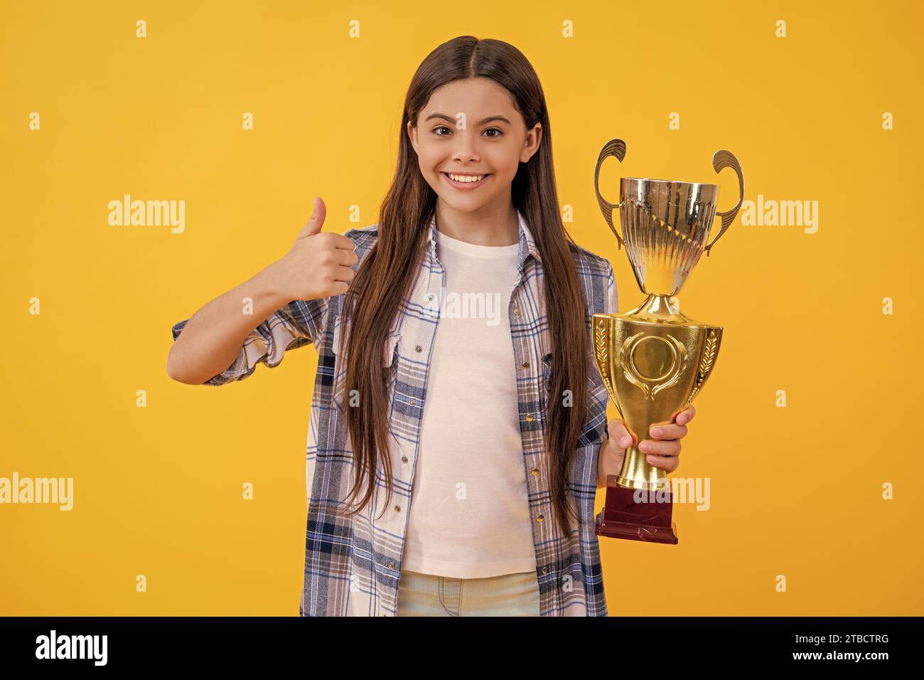 teen girl receive award in studio, thumb up. teen girl accept award on ...