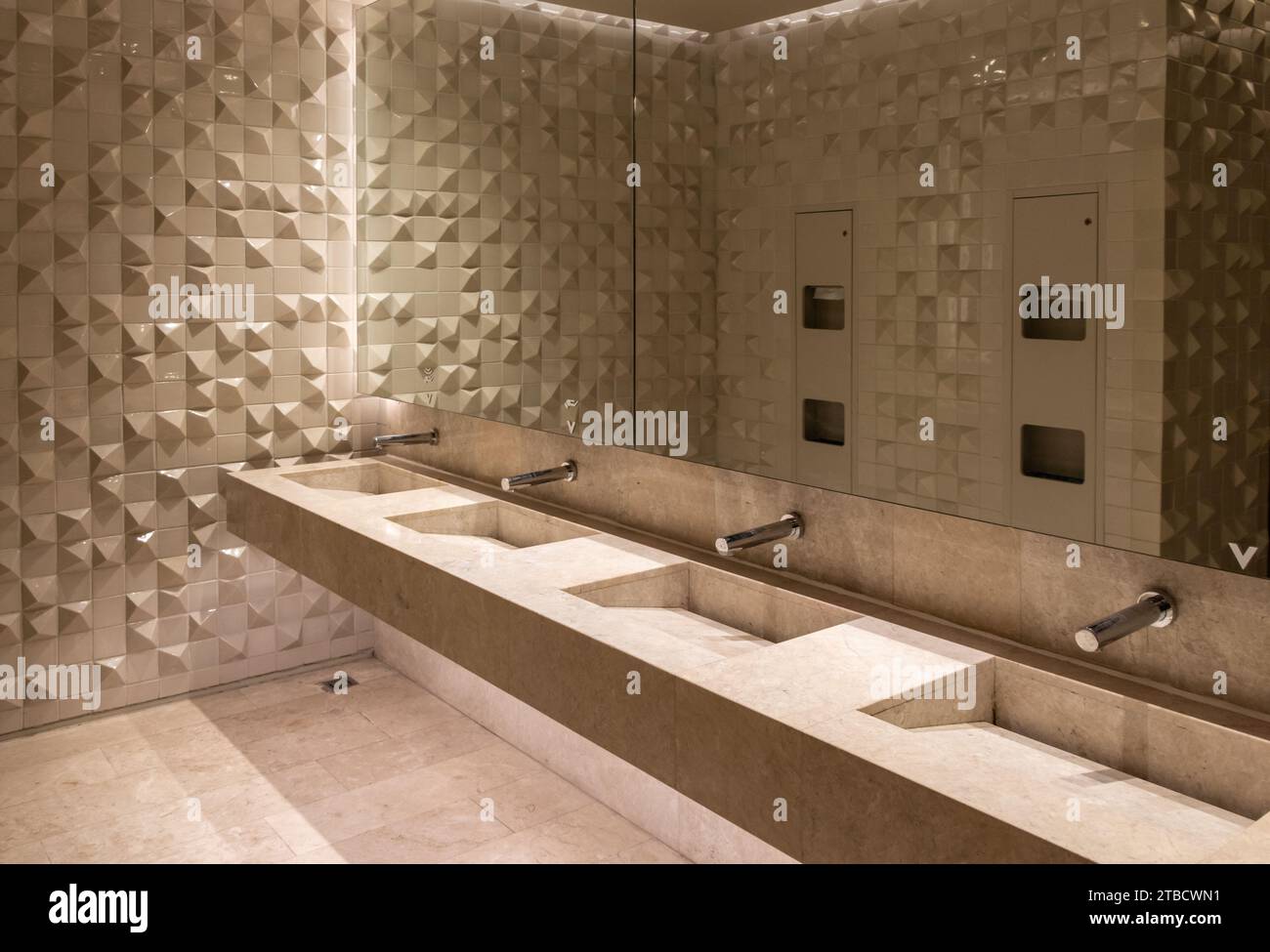 Public toilet hand washing sinks Stock Photo - Alamy