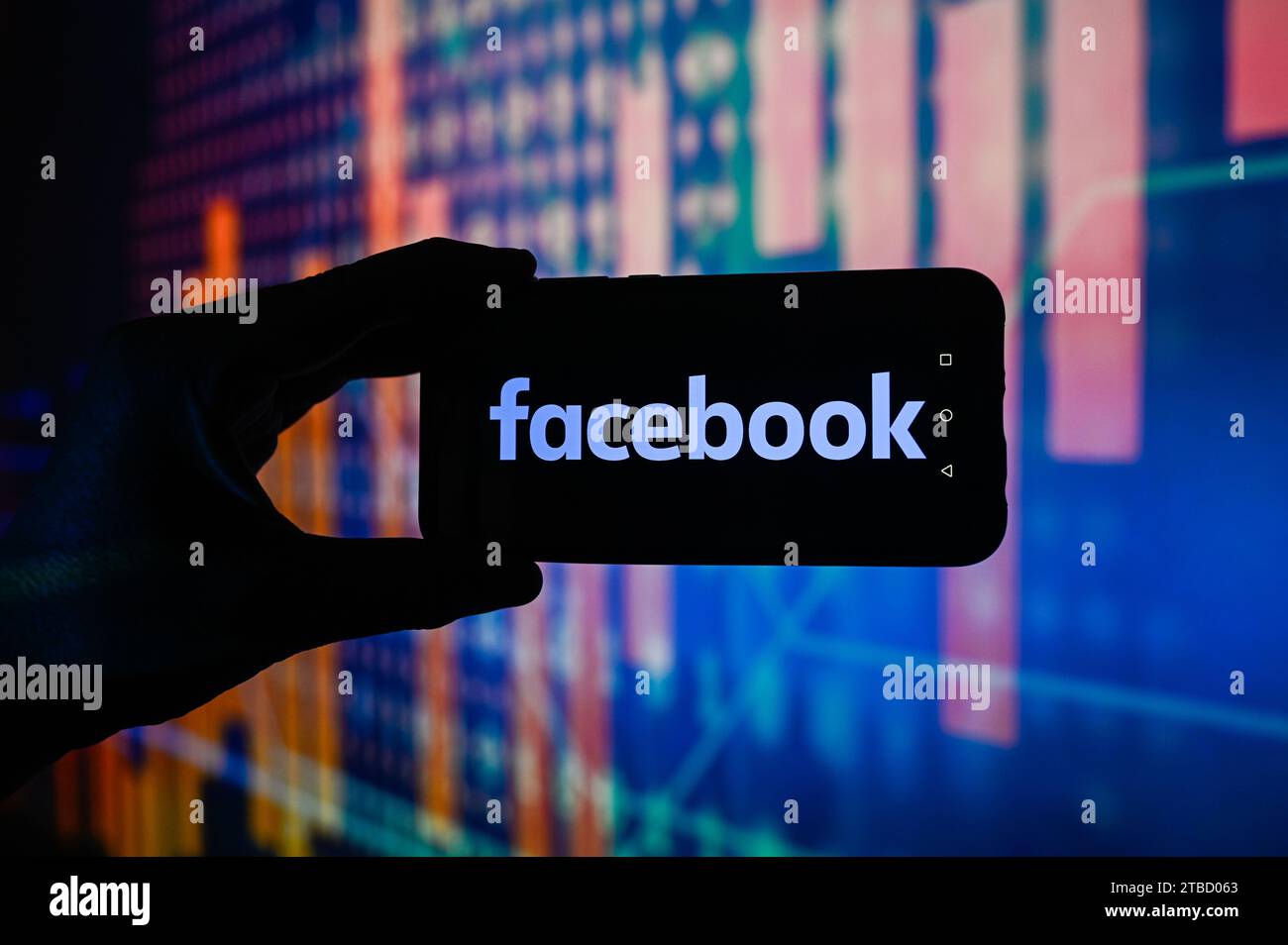 In this photo illustration a Facebook logo is displayed on a smartphone ...