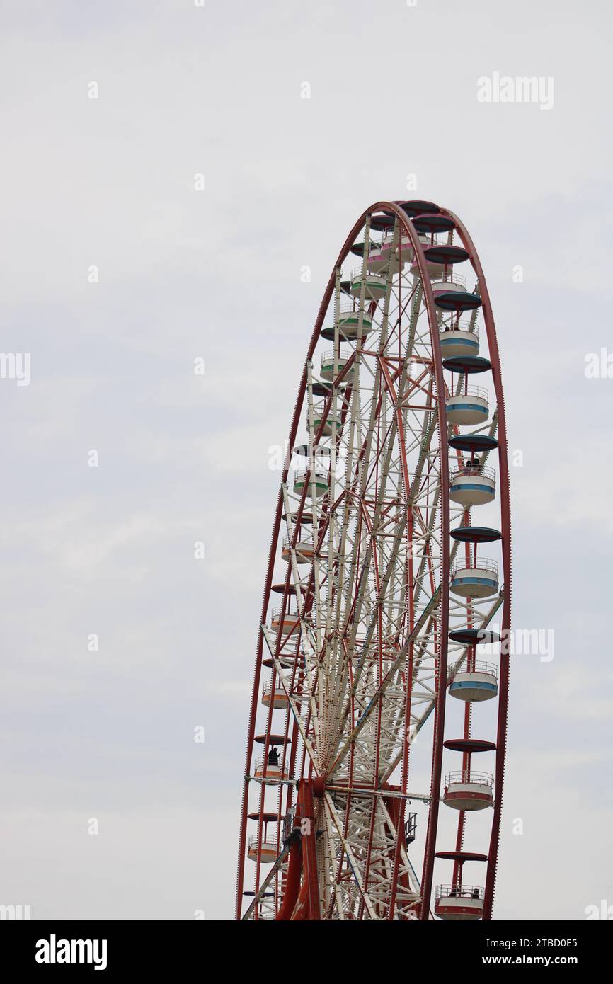 Ferris wheel in a playground in Batumi Square Stock Photo - Alamy
