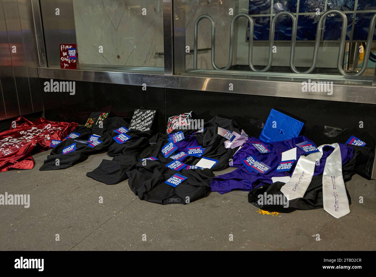 NEW YORK, NEW YORK - DECEMBER 5: Graduation caps and gowns are left on ...