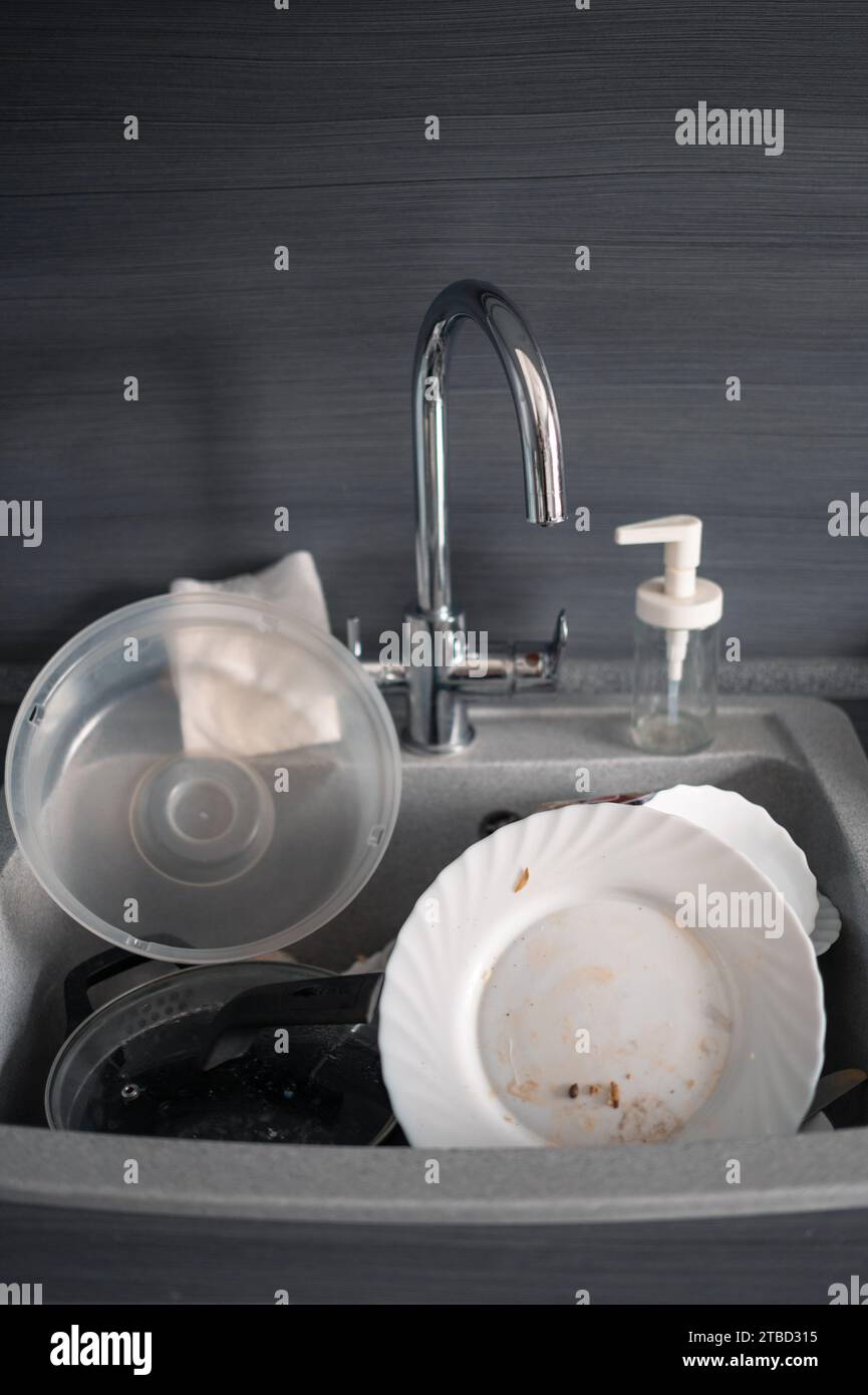 A lot of dirty utensil on the kitchen Stock Photo - Alamy