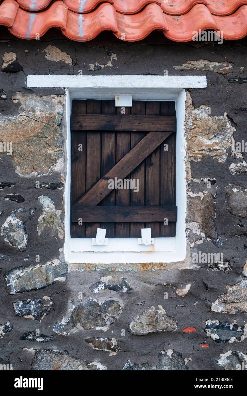 Boarded up window on a cottage in November. Crovie, Aberdeenshire ...