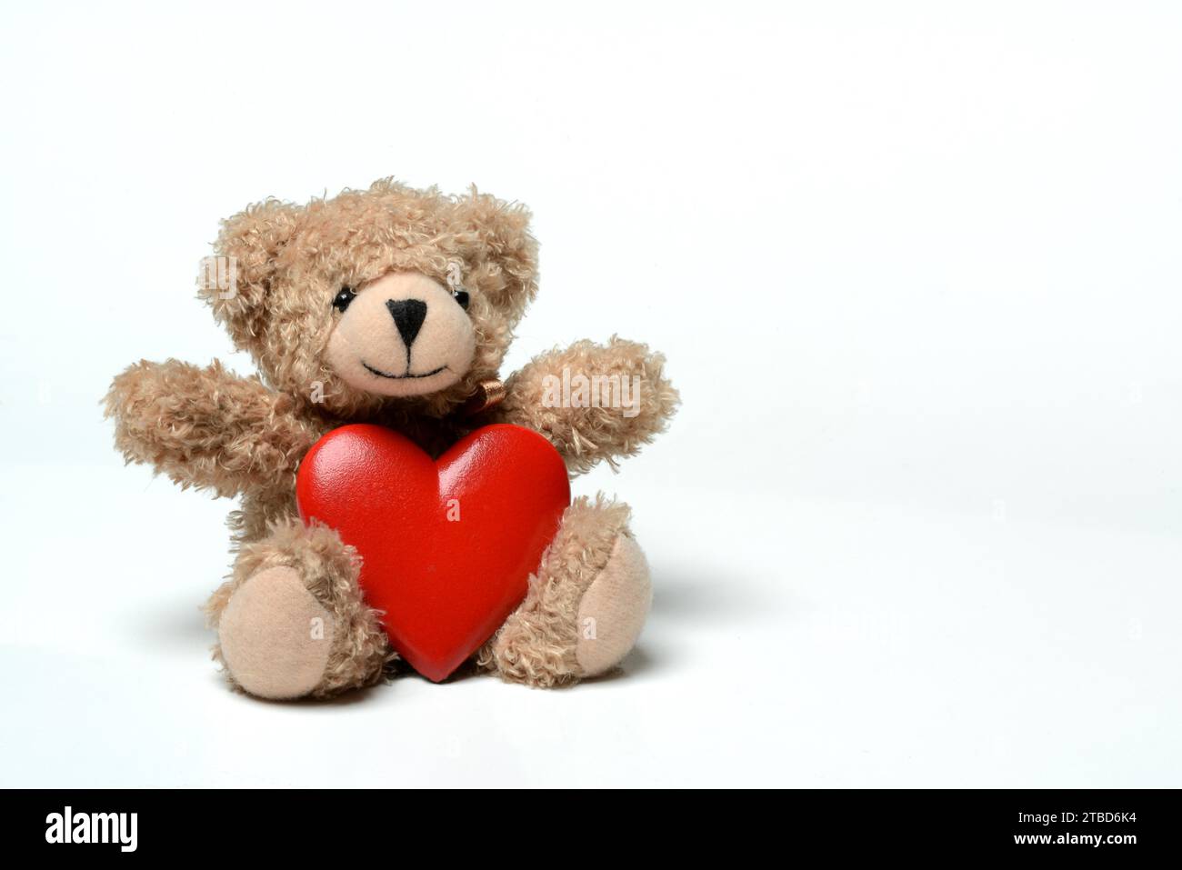 Teddy, teddy bear with red heart Stock Photo - Alamy