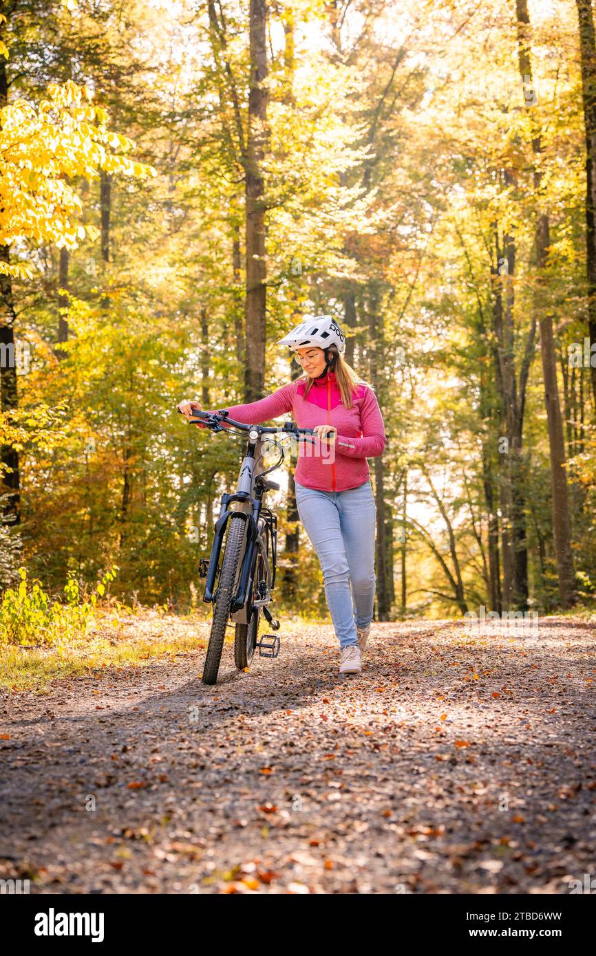 Bicycle drive through forest autumn hi-res stock photography and images - Alamy
