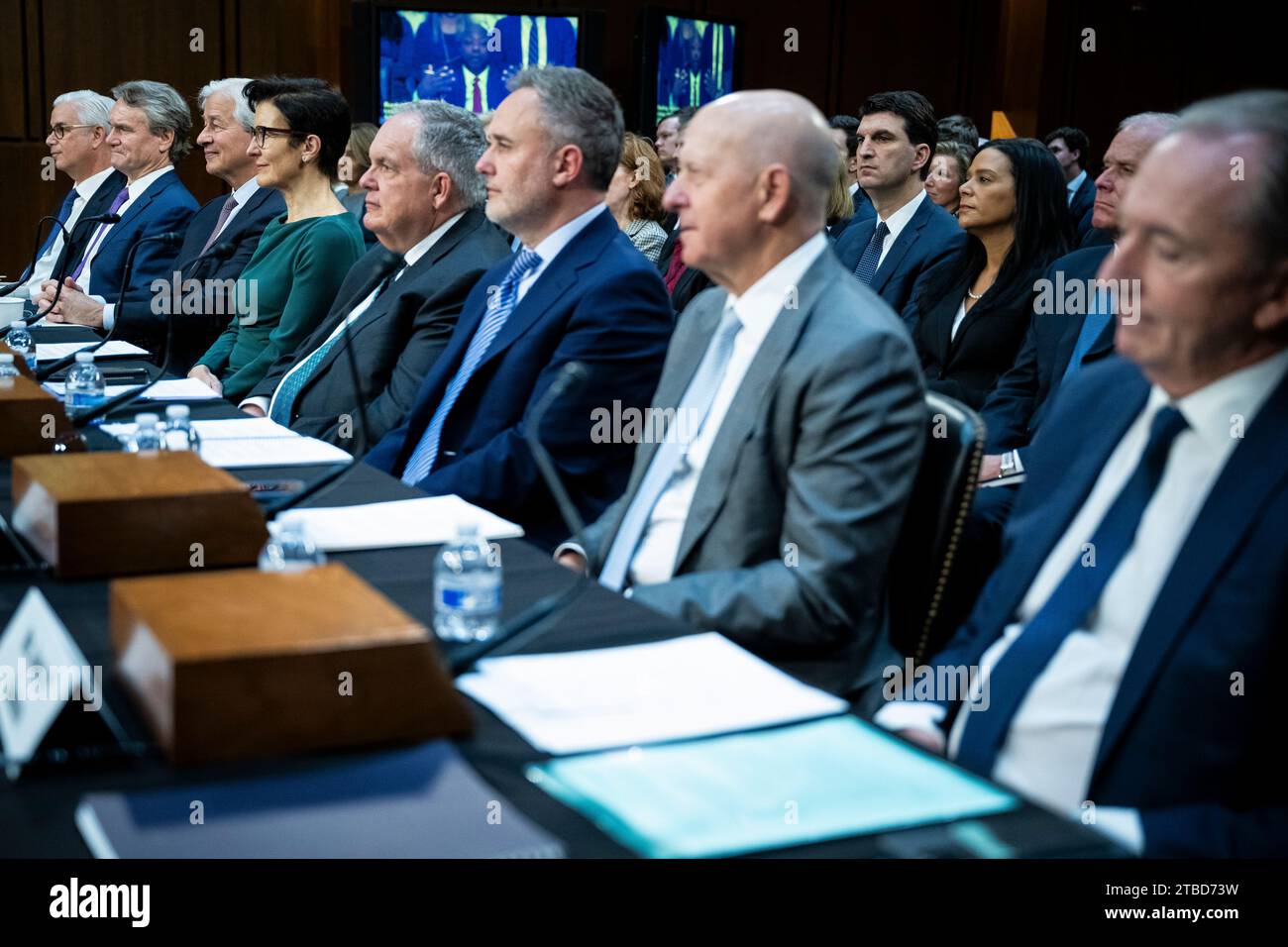 Left-to-right: Wells Fargo & Company CEO and President Charles Scharf ...