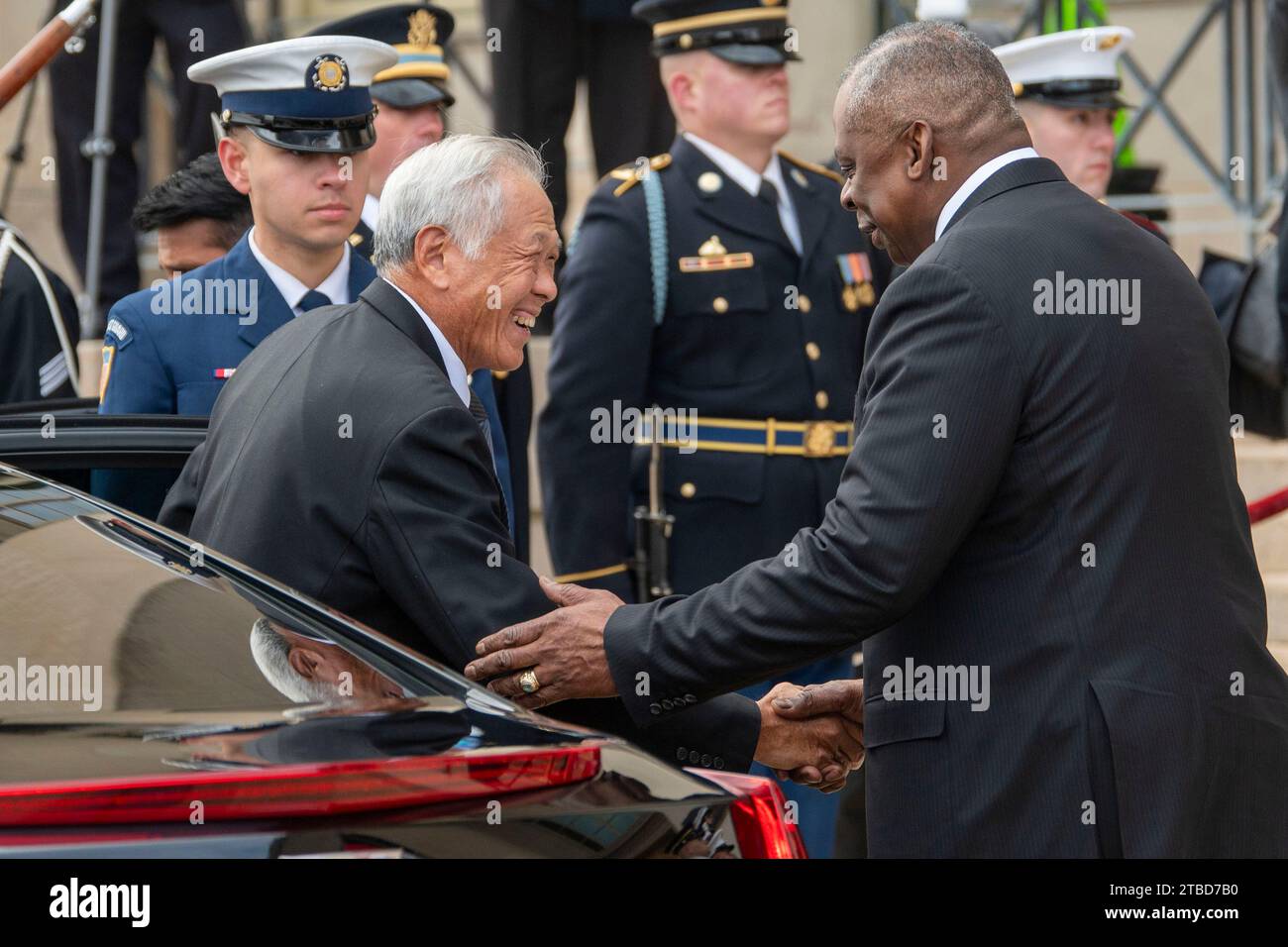 Defense Secretary Lloyd Austin, right, welcomes Singapore's Defense ...