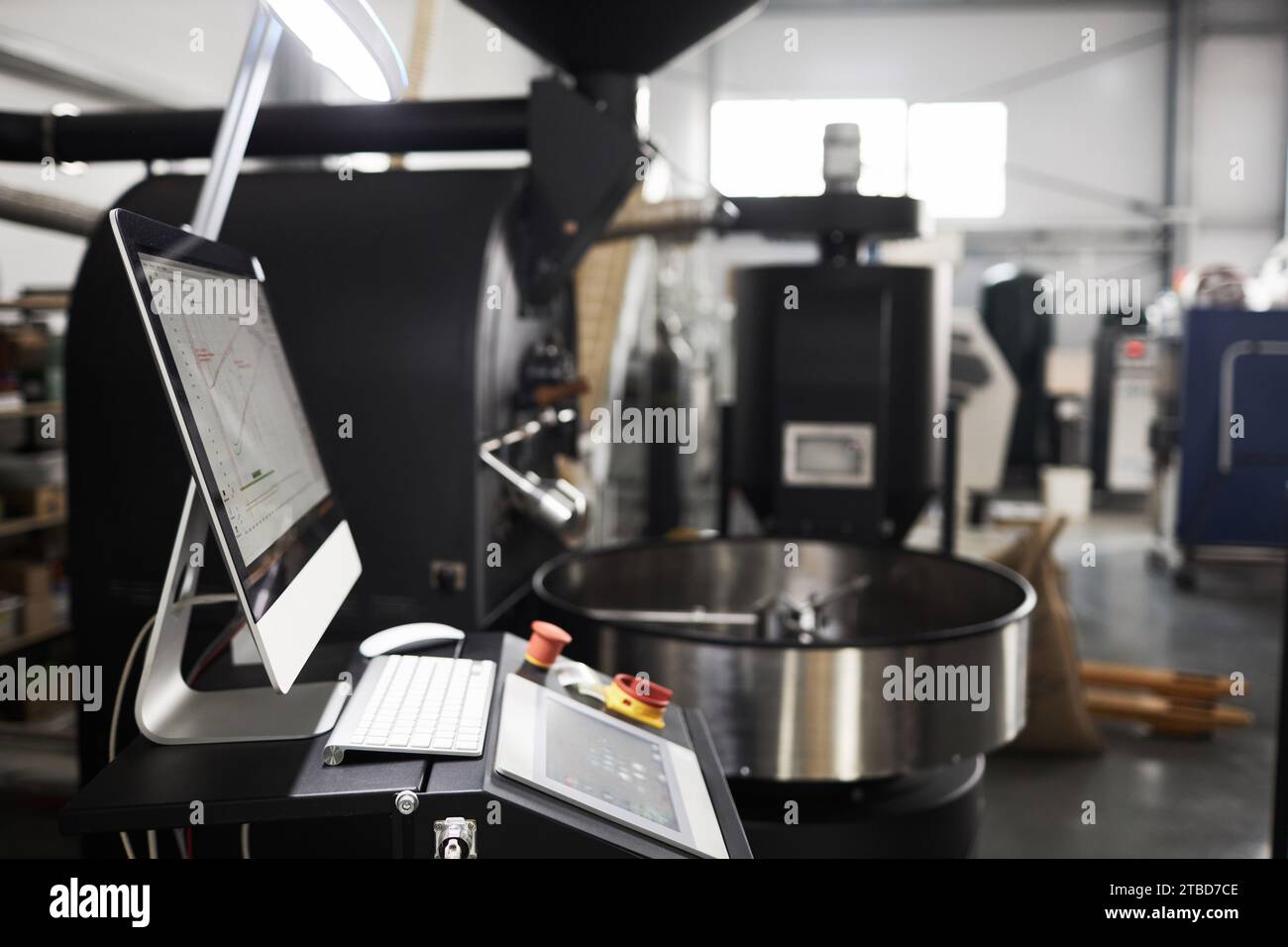 Side view background image of machines and equipment in coffee roastery ...