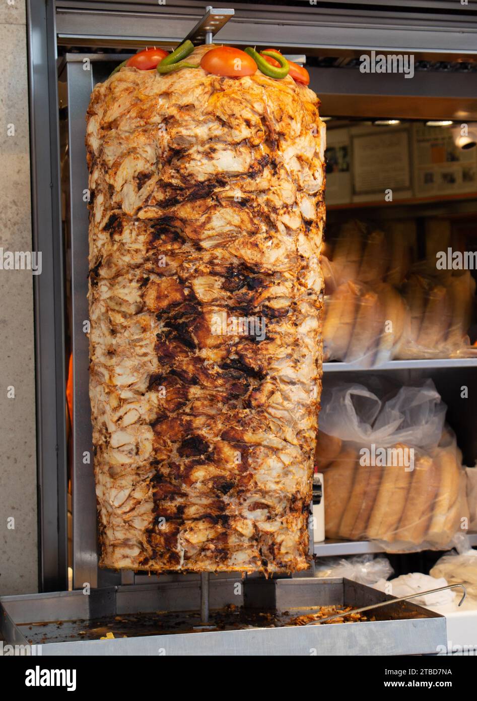 Traditional Turkish food Doner Kebab. Turnspit skewing kebap kebab ...